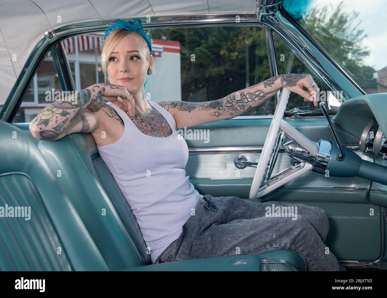 Ford Thunderbird low rider with LA Gang style girl Stock Photo - Alamy