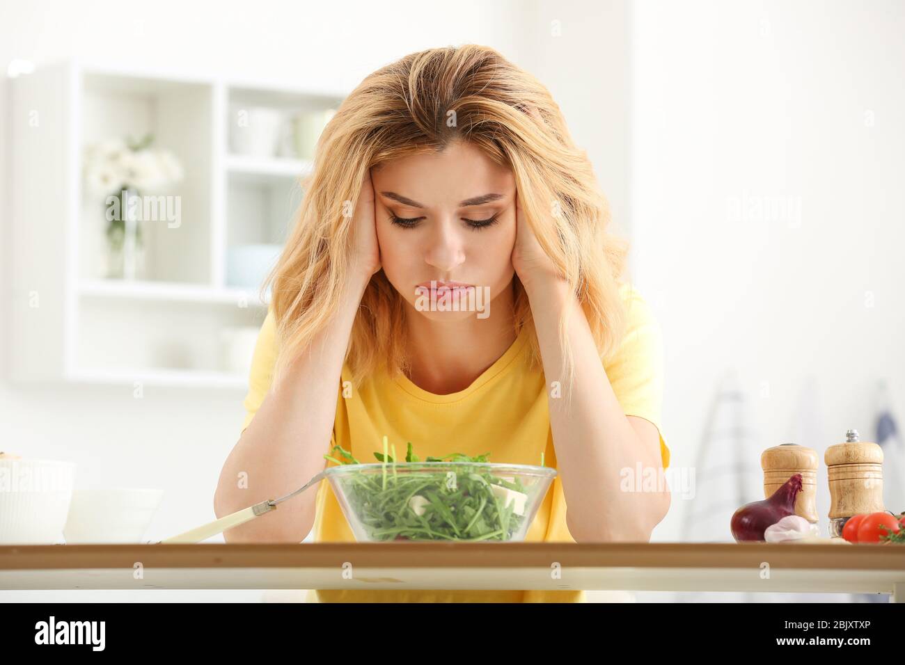 Reluctant woman healthy vegetable hi-res stock photography and images ...