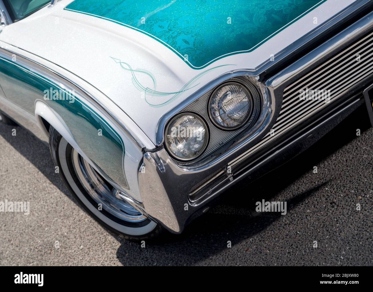 Ford Thunderbird low rider with LA Gang style girl Stock Photo - Alamy