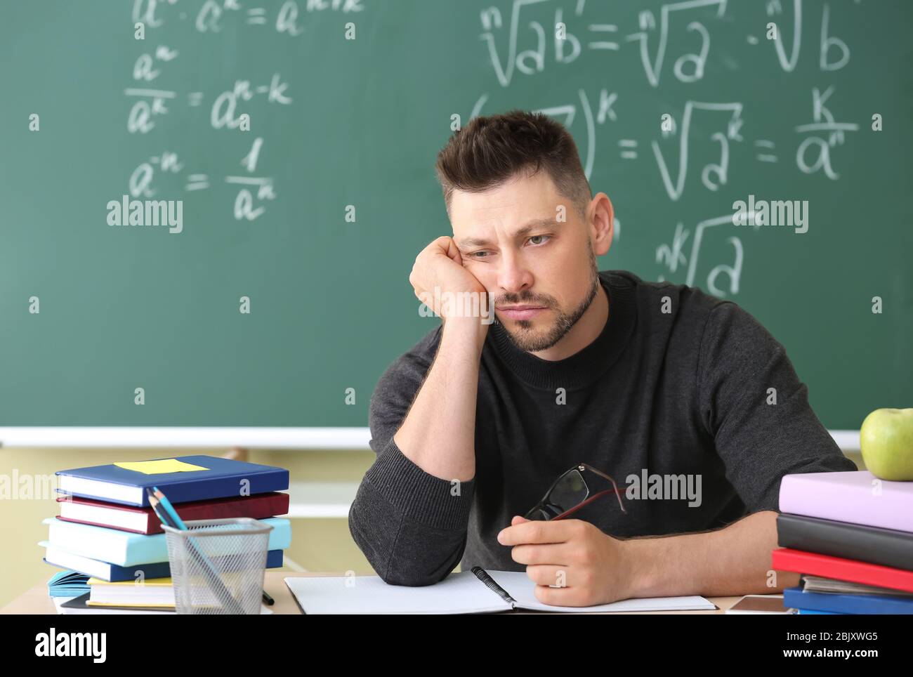 Exhausted Teacher In Classroom High Resolution Stock Photography and ...