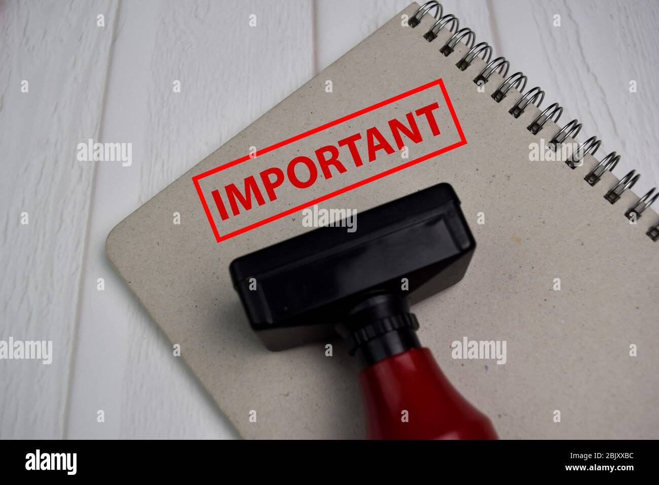 Red Handle Rubber Stamper and Important text isolated on White ...