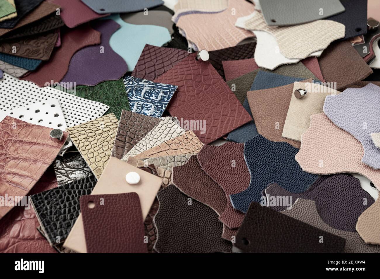 Set of multi-colored pieces of genuine leather of different textures ...