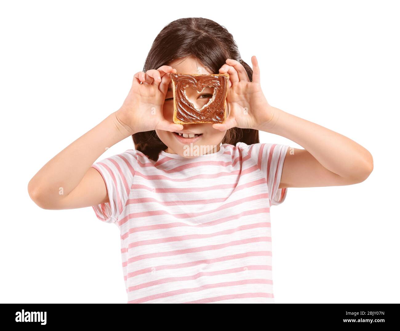 Funny little girl with tasty toast on white background Stock Photo - Alamy