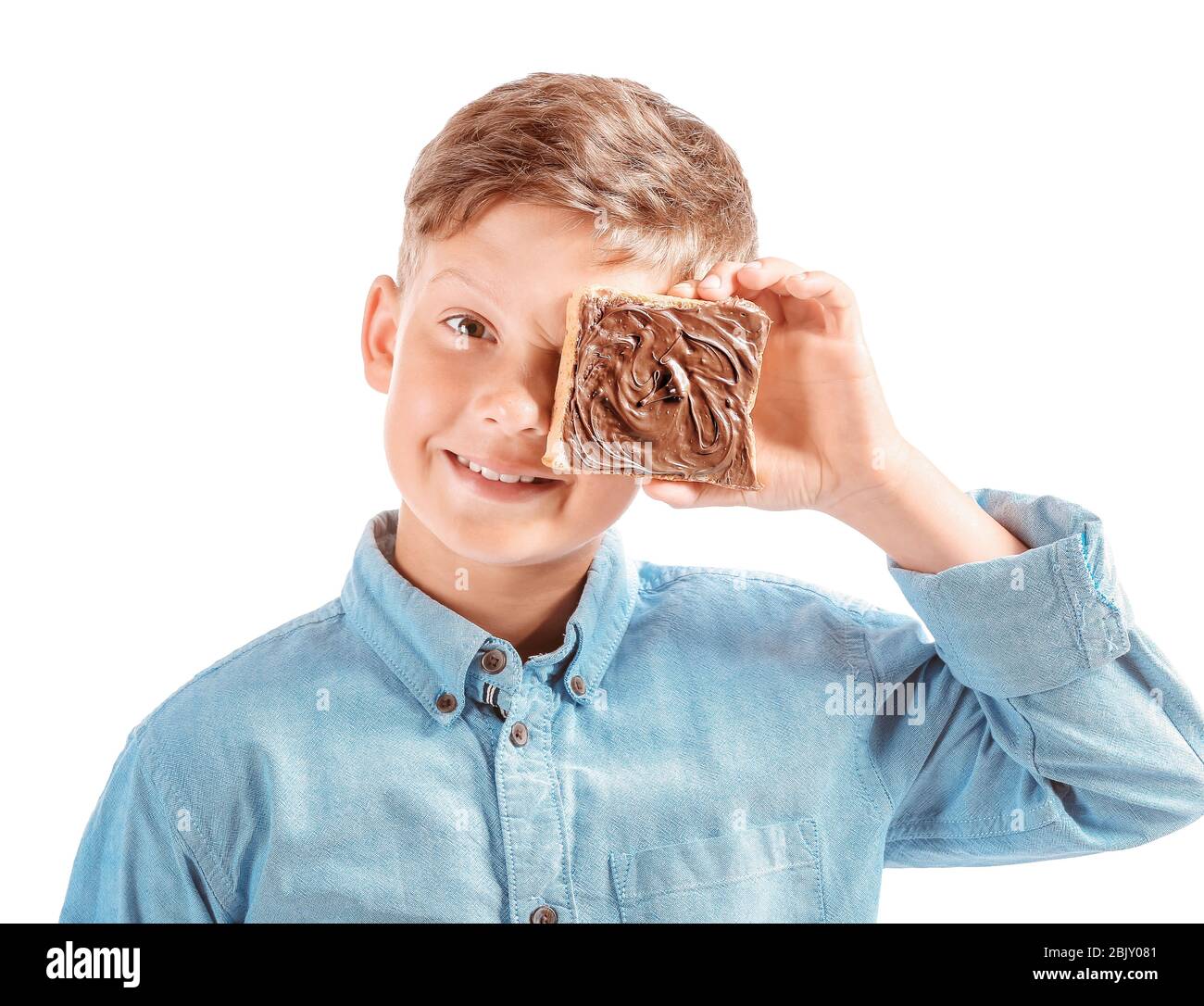 Funny little boy with tasty toast on white background Stock Photo - Alamy