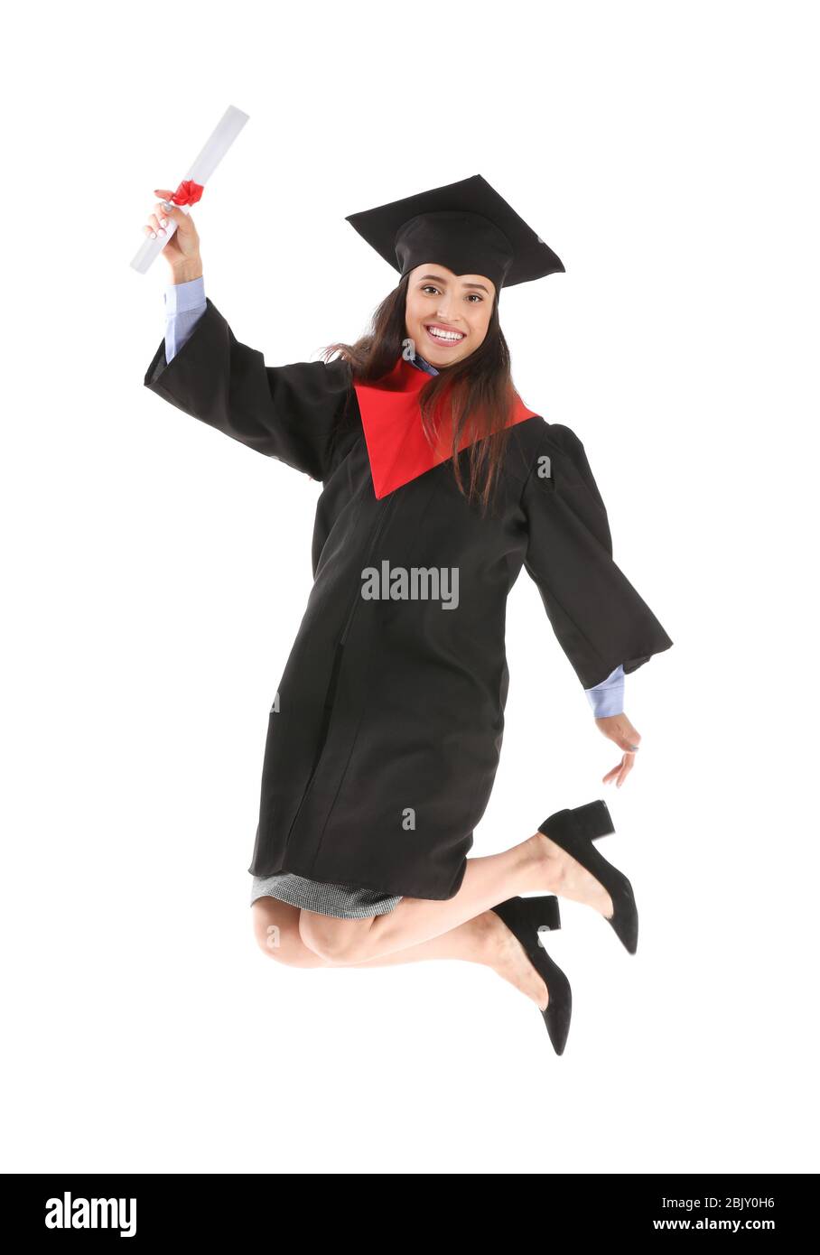 Jumping female graduate with diploma on white background Stock Photo ...