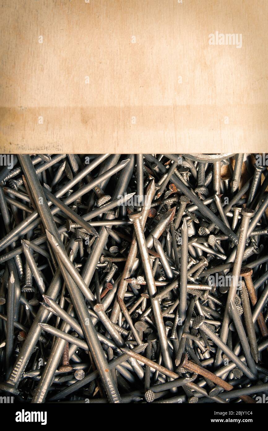 lots of nails in the box Stock Photo - Alamy