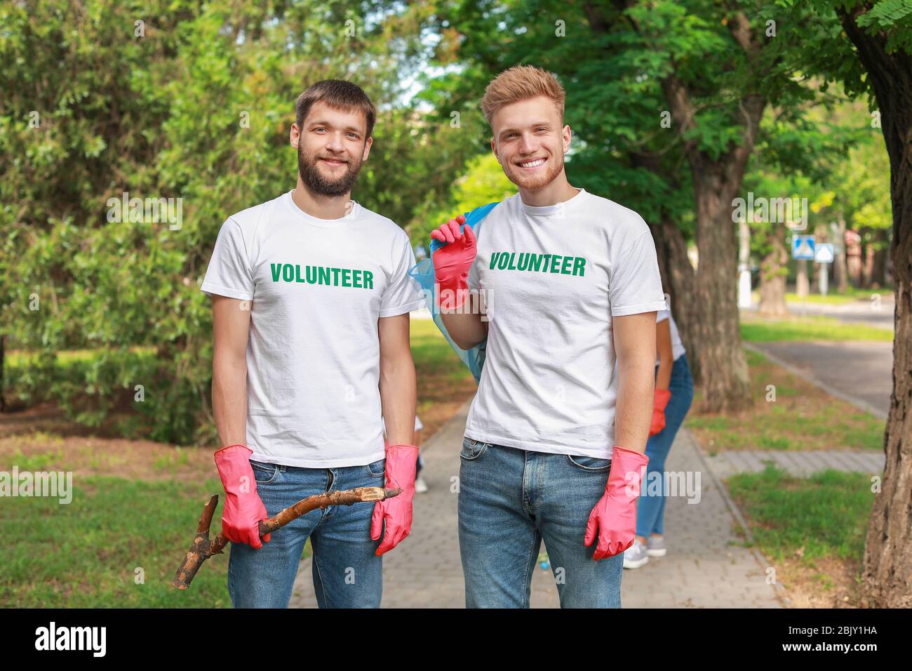 Volunteers gathering garbage in hi-res stock photography and images - Alamy