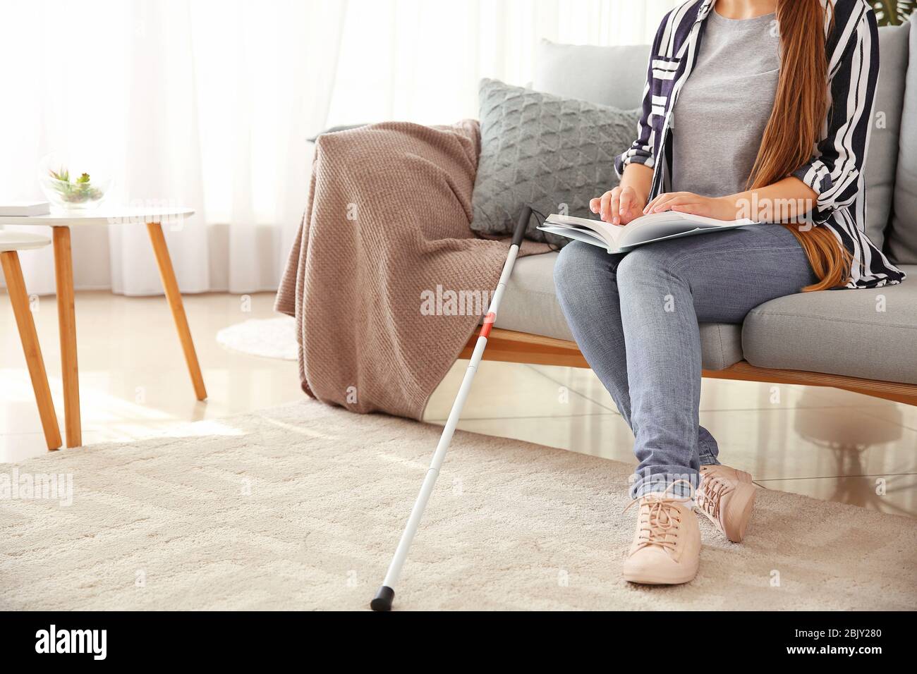 Blind girl reading braille hi-res stock photography and images - Alamy