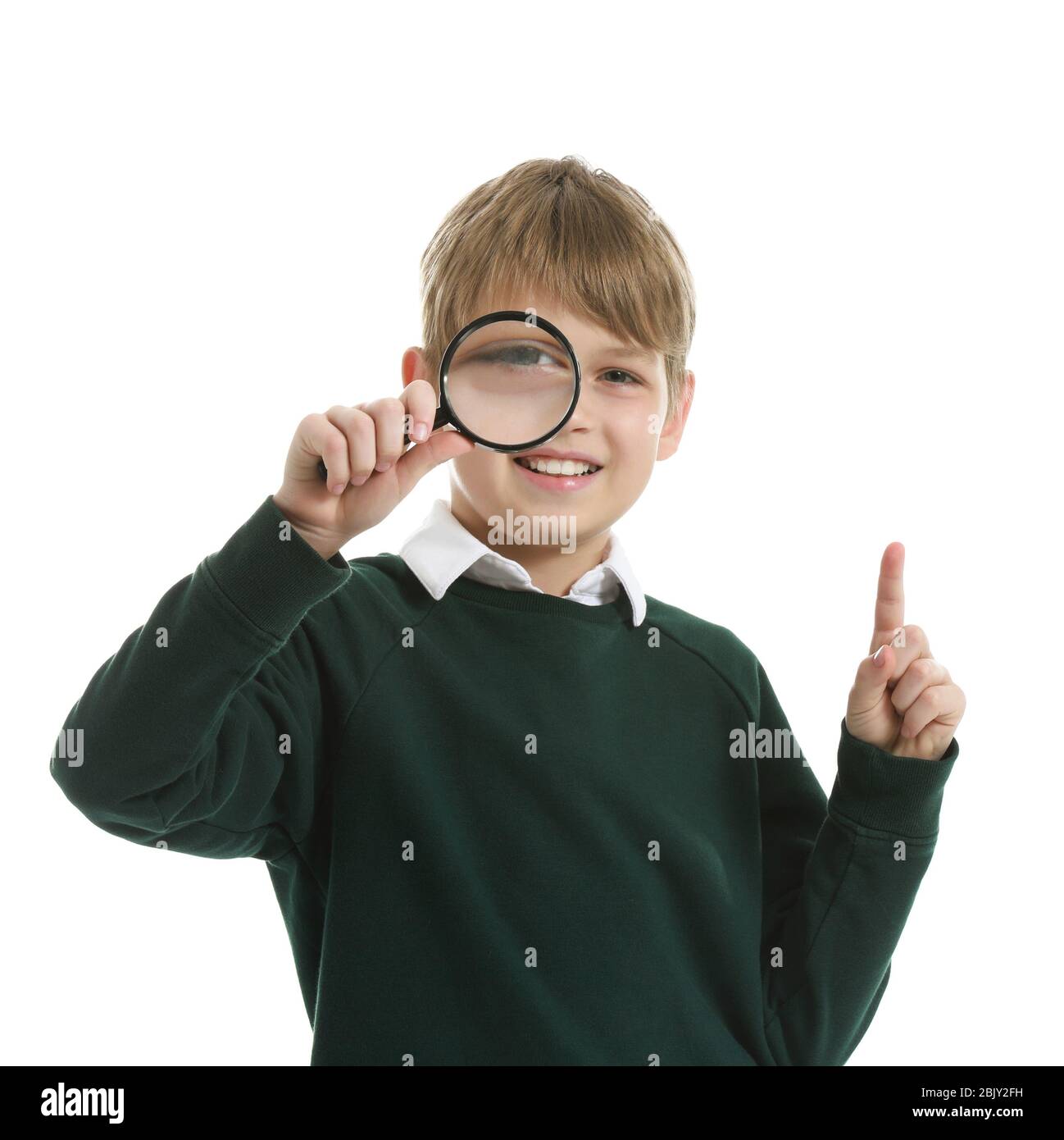 Little boy with magnifying glass and raised index finger on white ...