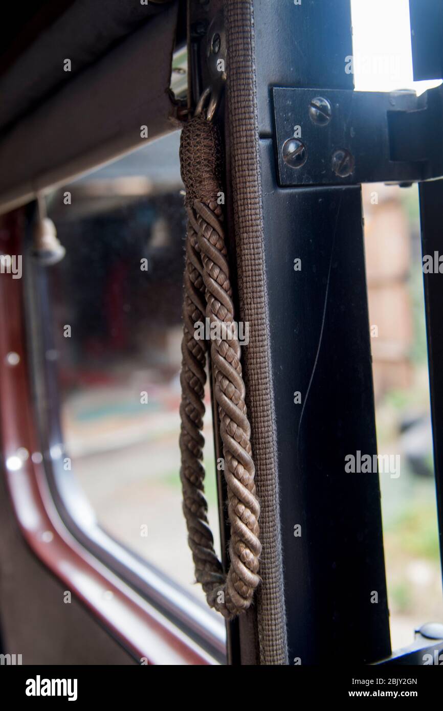 Silk rope grab handle in the rear a 1931 Buick car Stock Photo - Alamy