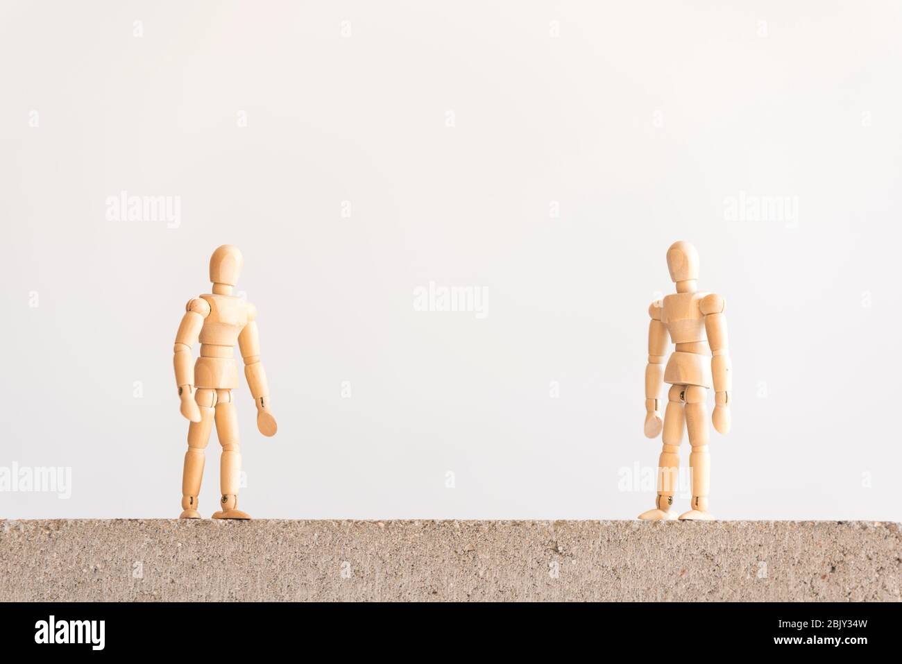 Two standing figures separated hi-res stock photography and images - Alamy