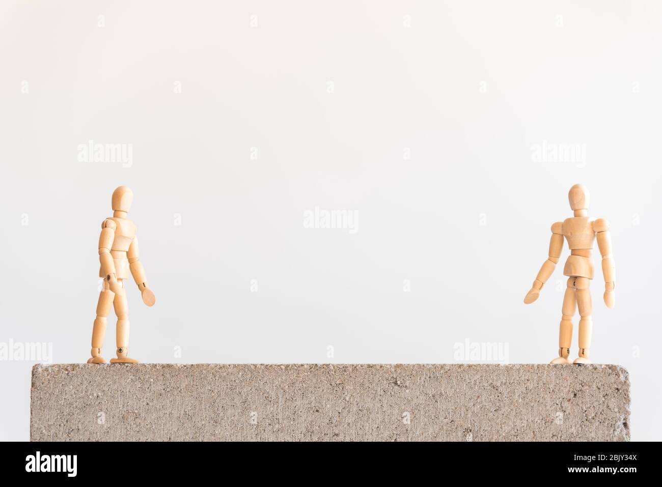 Two standing figures separated hi-res stock photography and images - Alamy