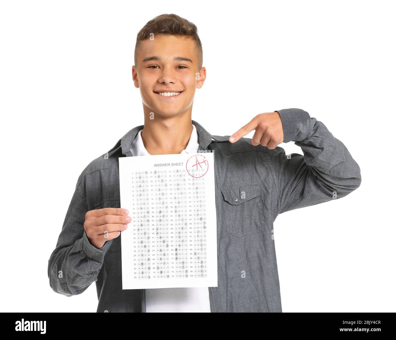 Happy boy with results of school test on white background Stock Photo ...
