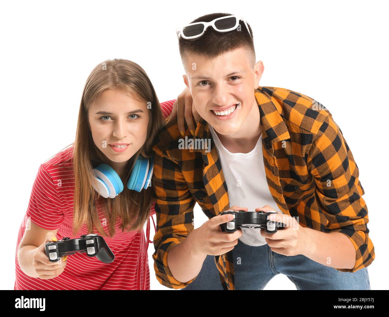 Teenagers playing video game on white background Stock Photo - Alamy