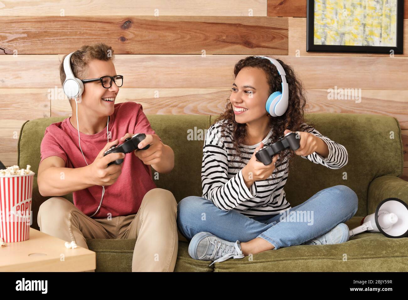 Teenagers playing online game hi-res stock photography and images - Alamy