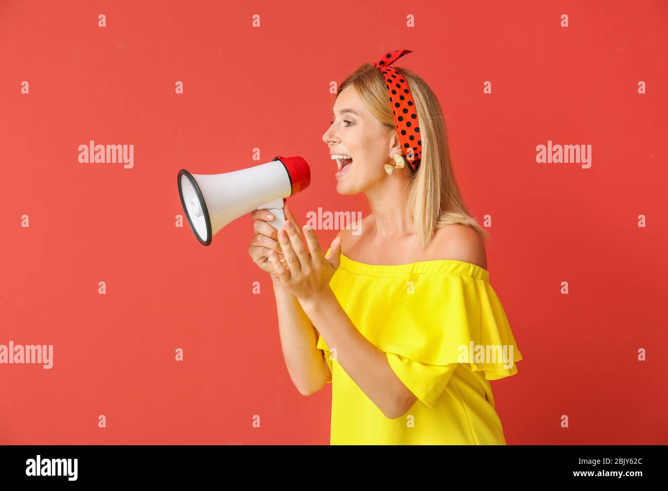 Woman screaming red loudspeaker hi-res stock photography and images - Alamy