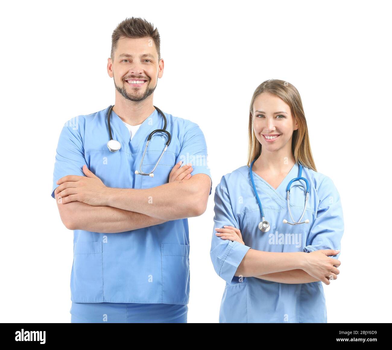 Male and female nurses on white background Stock Photo - Alamy