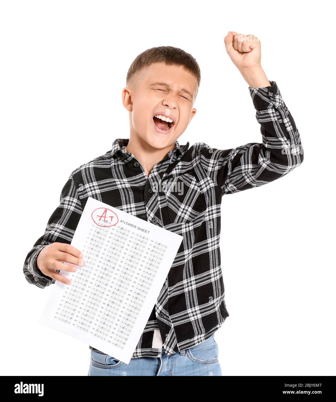 Happy boy with answer sheet for school test on white background Stock ...