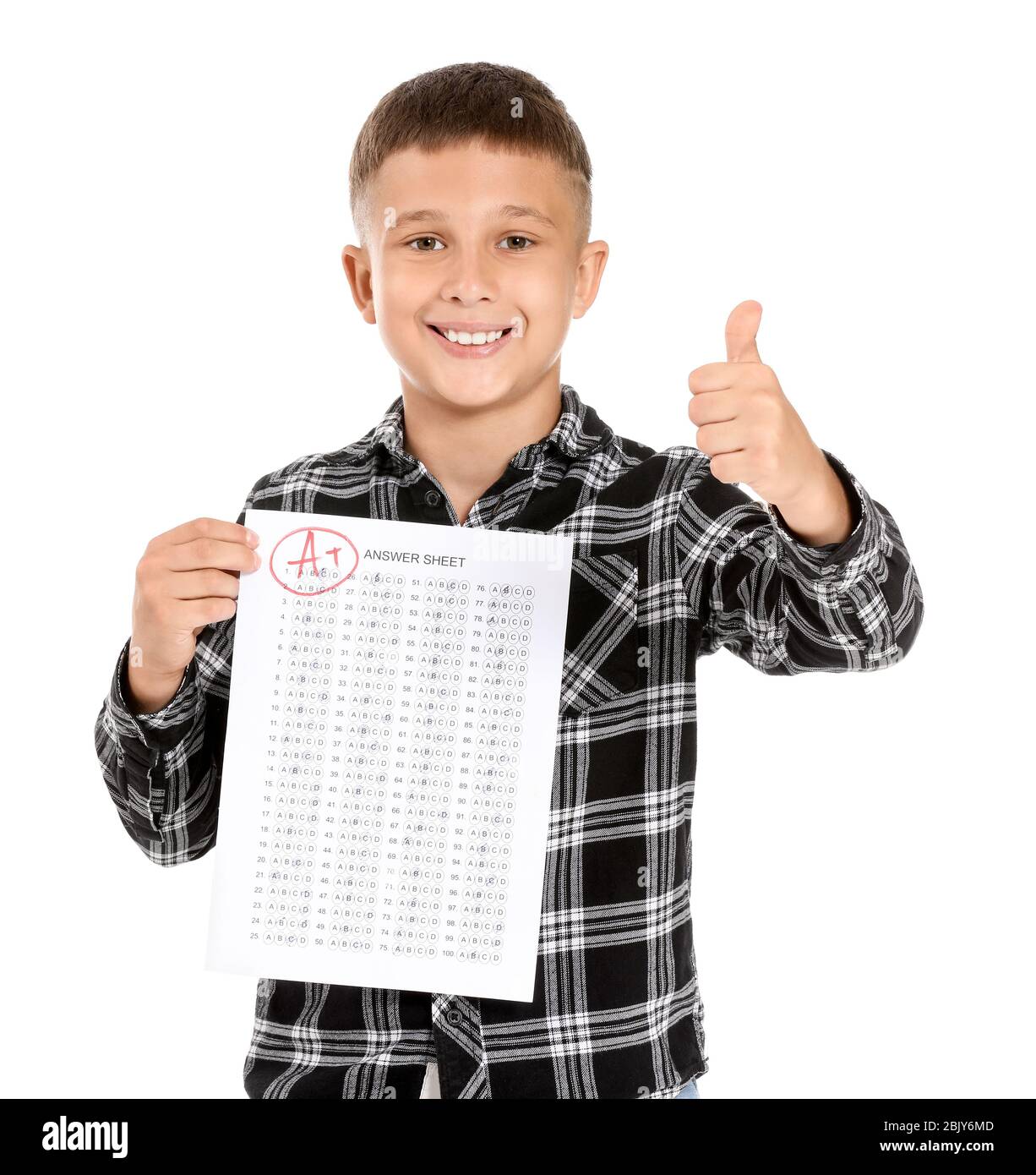 Happy boy with answer sheet for school test on white background Stock ...