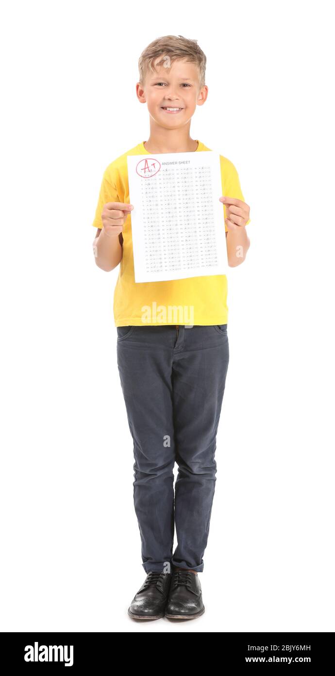 Happy boy with answer sheet for school test on white background Stock ...