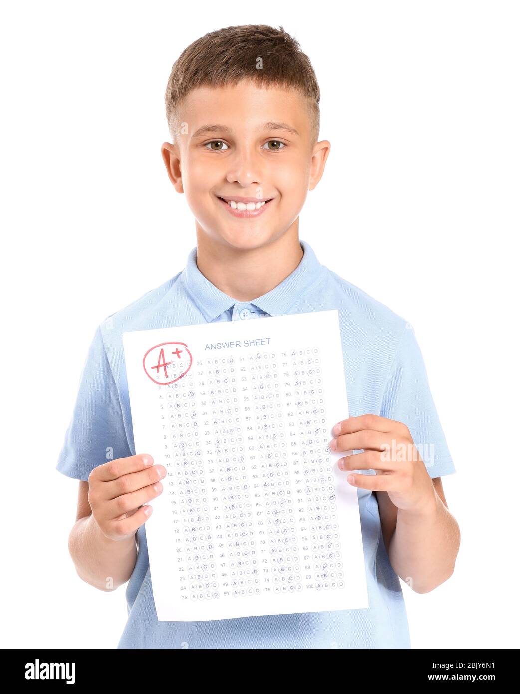 Happy boy with answer sheet for school test on white background Stock ...