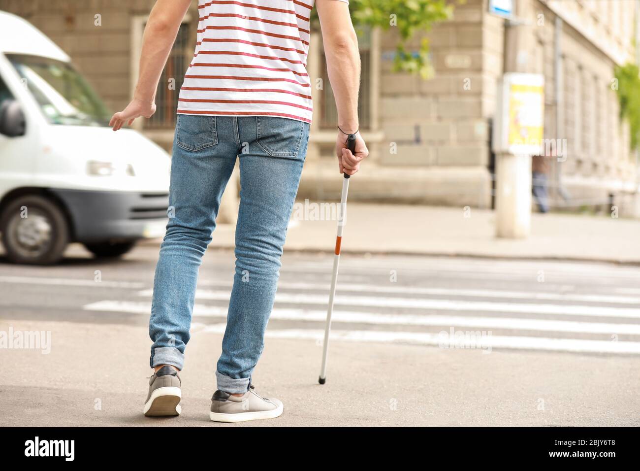Blind person crossing road hi-res stock photography and images - Alamy