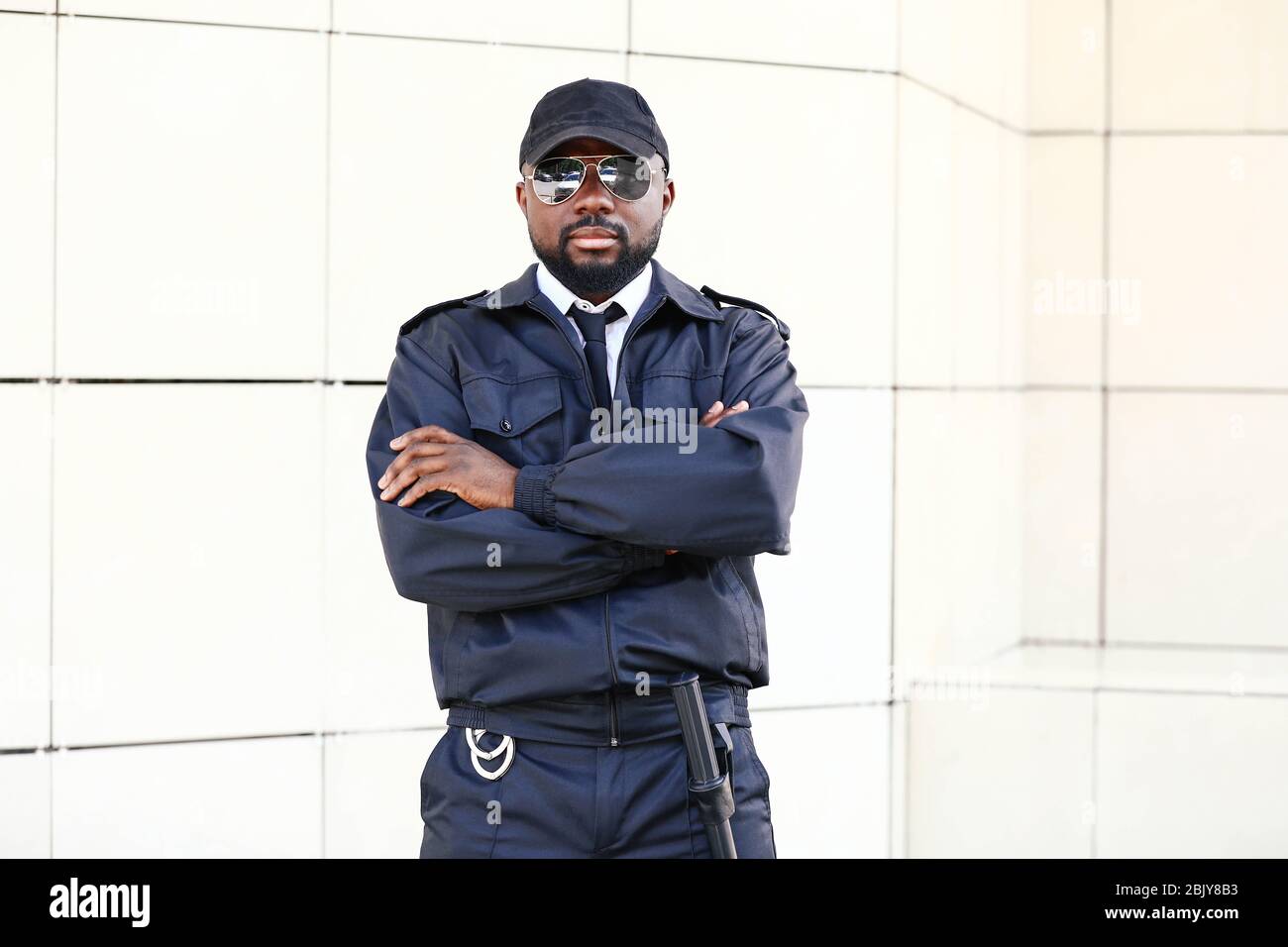 African-American security guard outdoors Stock Photo - Alamy