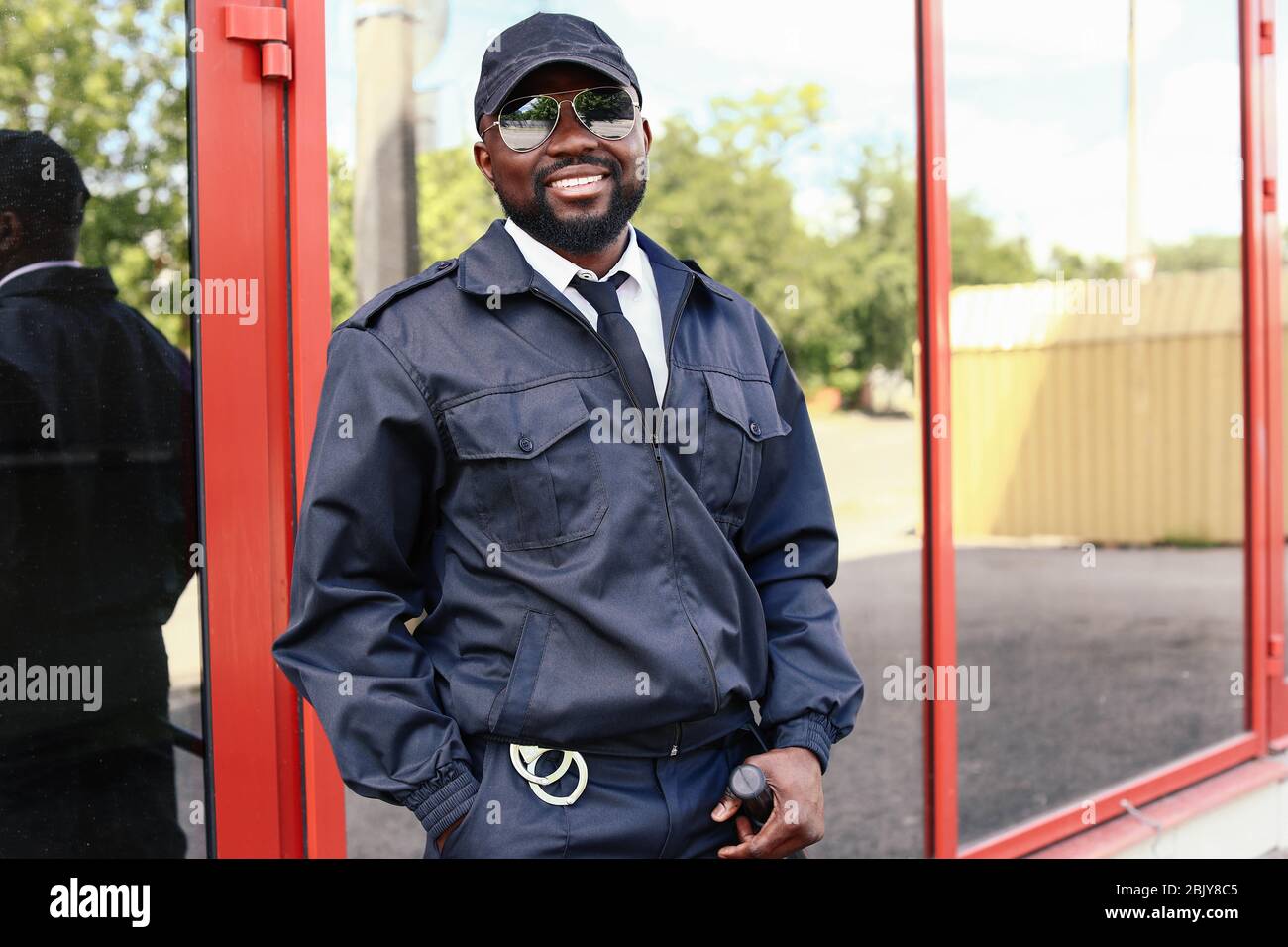 African-American security guard outdoors Stock Photo - Alamy