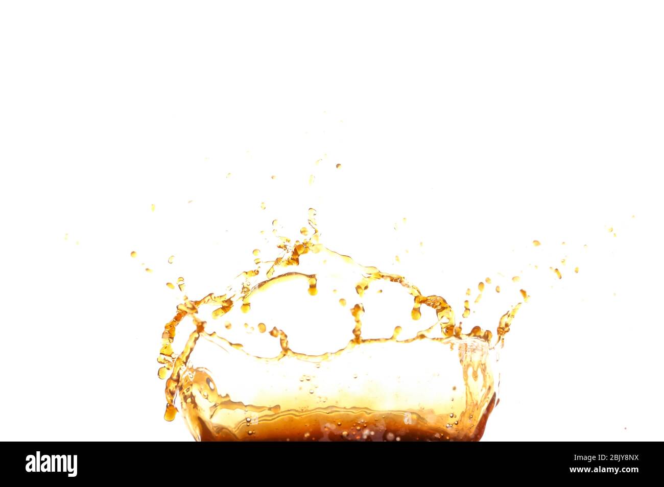 Splash of coffee on white background Stock Photo - Alamy