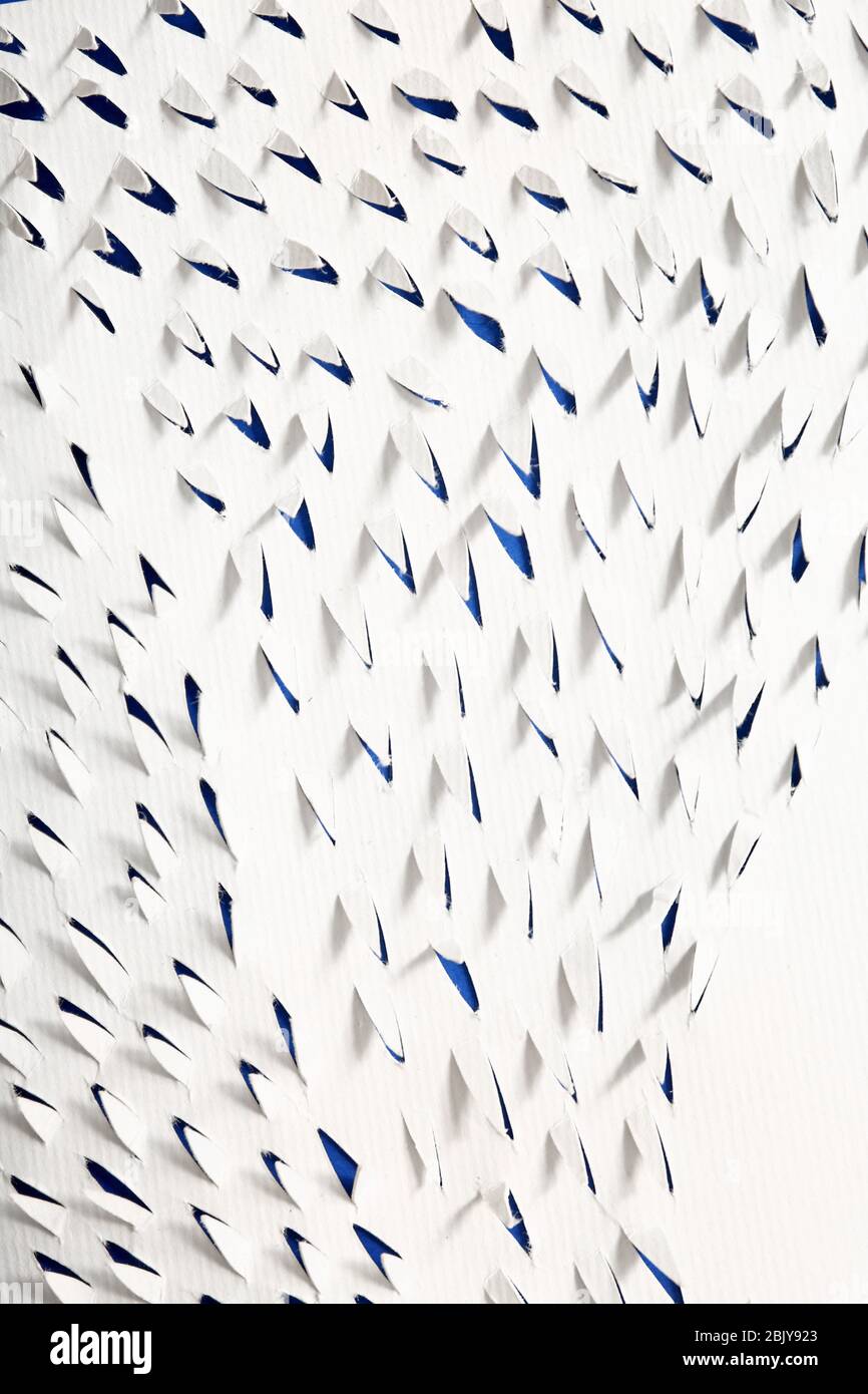 Texture of perforated paper, closeup Stock Photo - Alamy