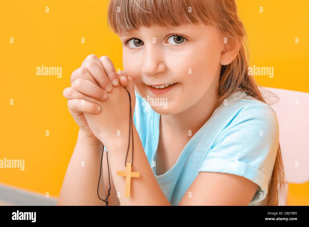 Little girl praying at home Stock Photo - Alamy