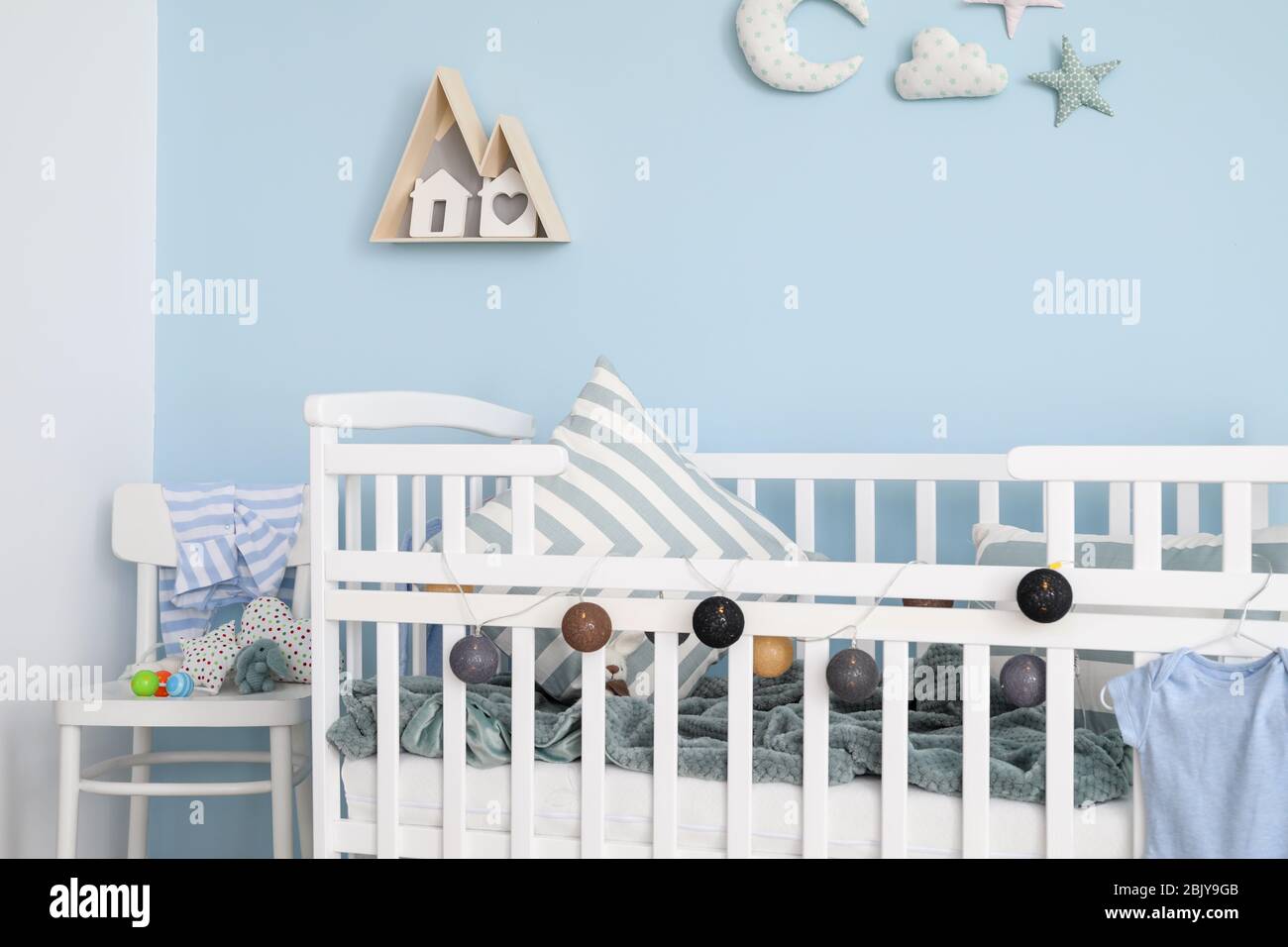 Interior of modern baby room with crib Stock Photo - Alamy
