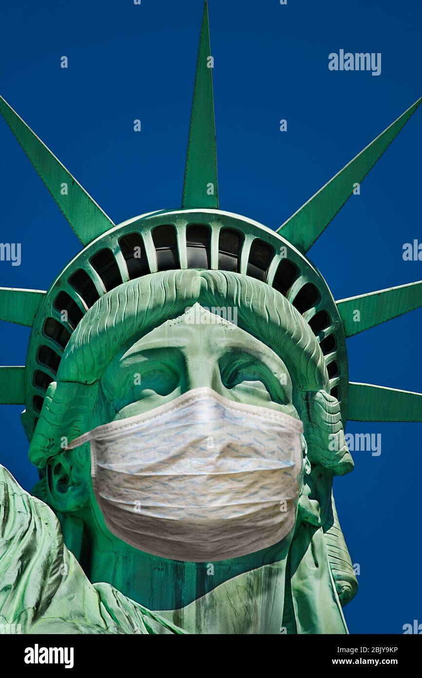 Statue of Liberty wearing protective mask Stock Photo - Alamy