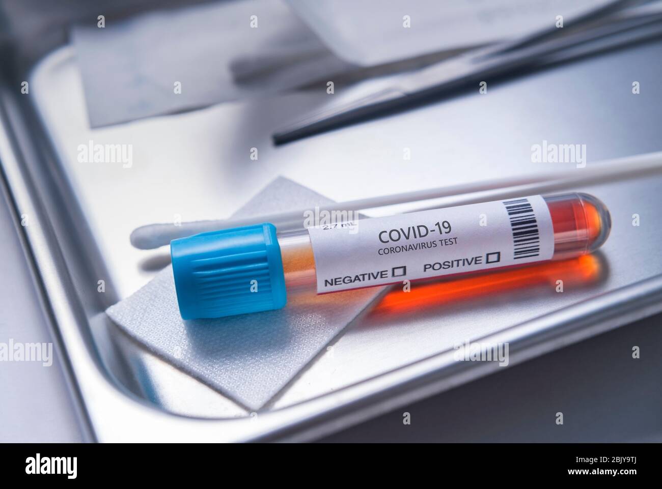 Test vial labelled 2019-nCoV on medical tray Stock Photo - Alamy