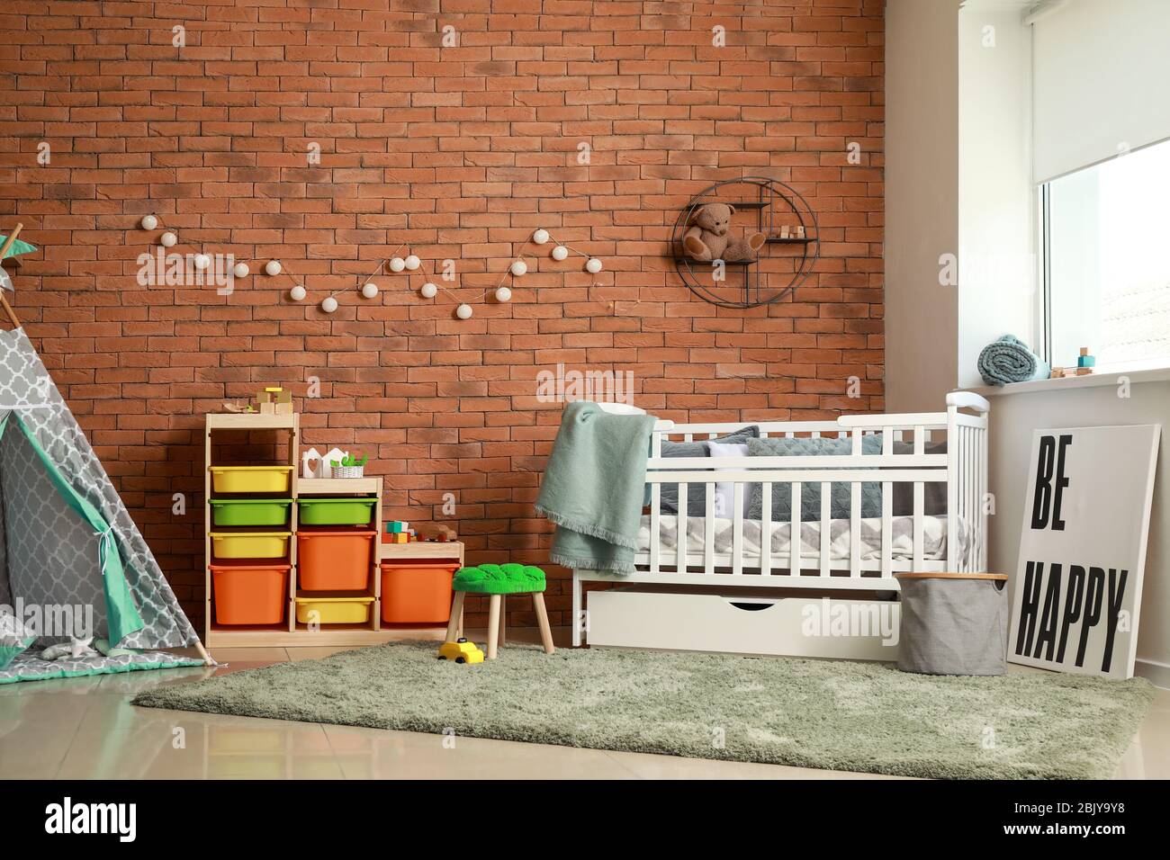 Interior of modern baby room with crib Stock Photo - Alamy