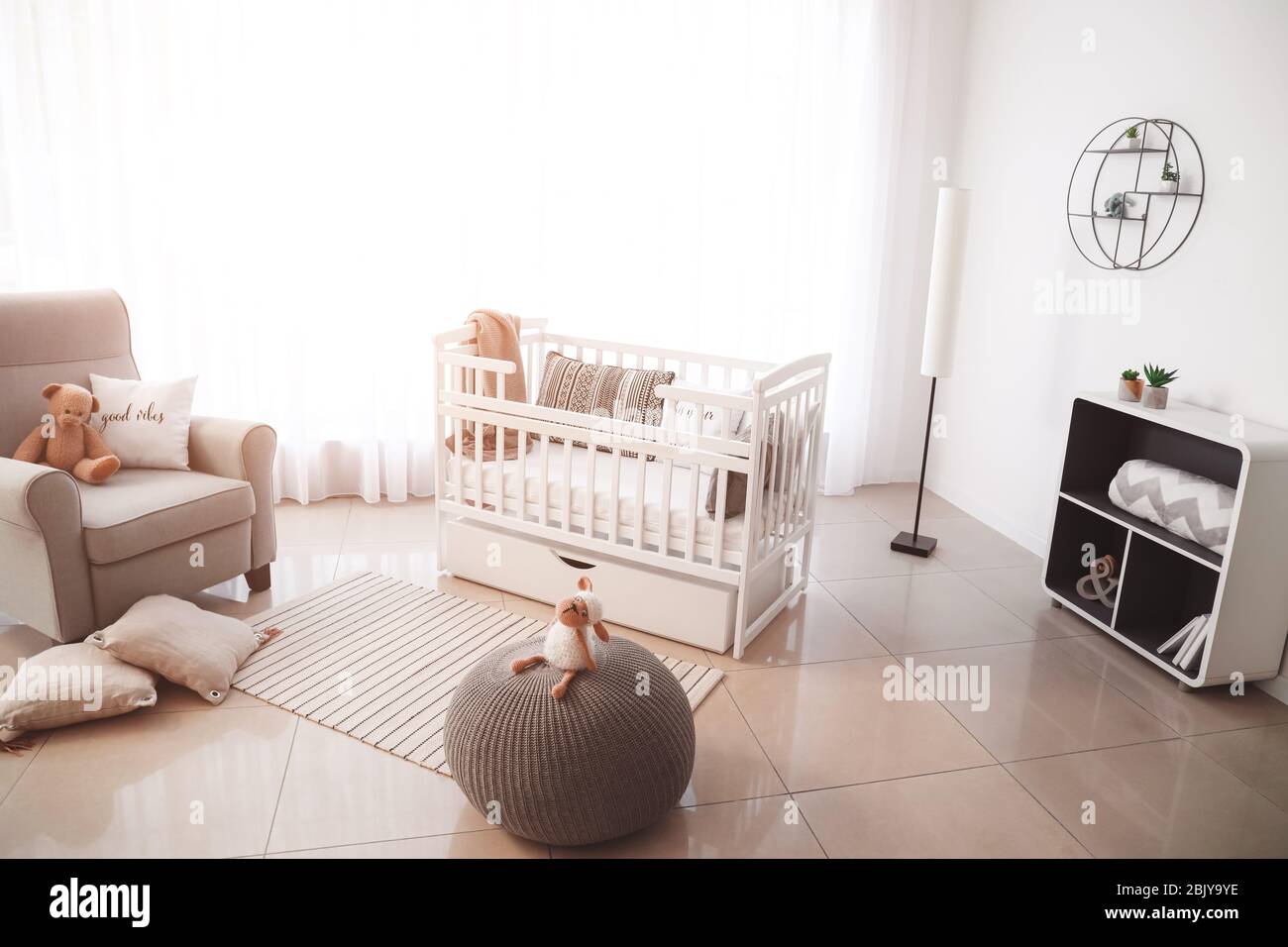 Interior of modern baby room with crib Stock Photo - Alamy