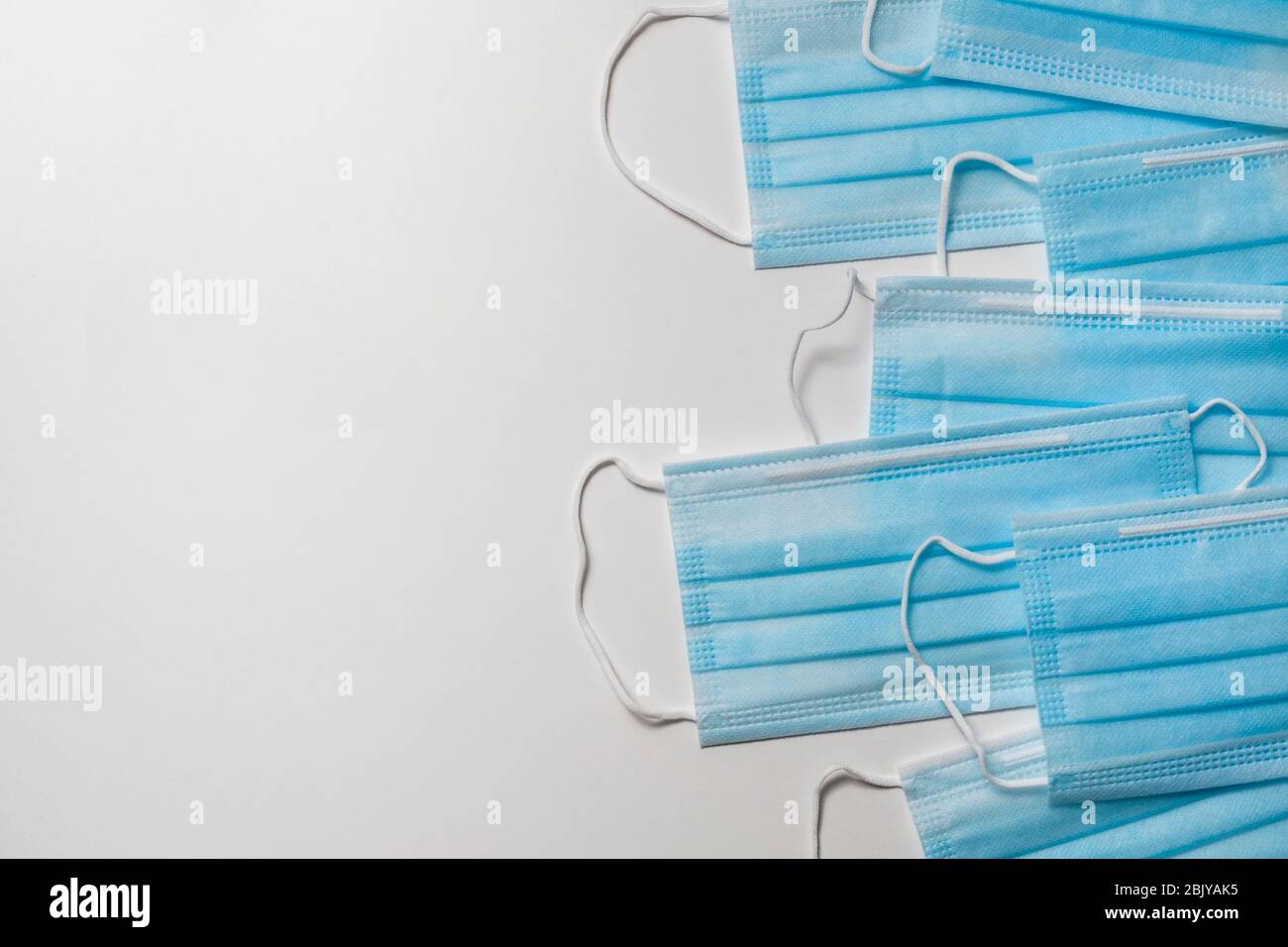 Blue medical masks hi-res stock photography and images - Alamy