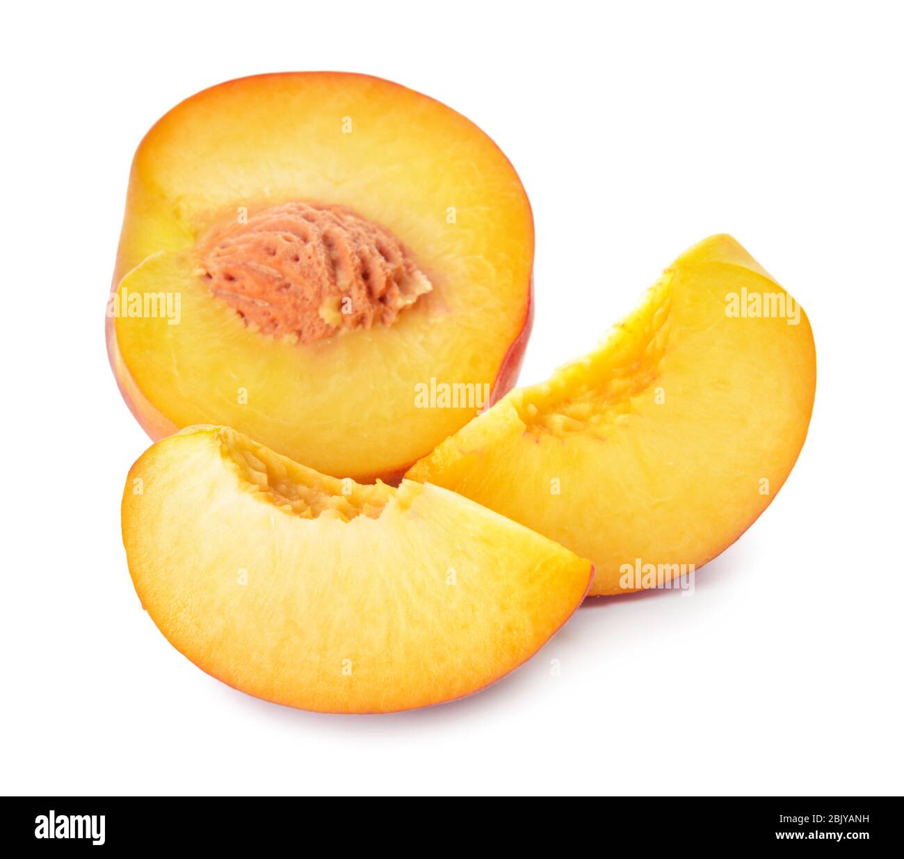 Ripe cut peach on white background Stock Photo - Alamy