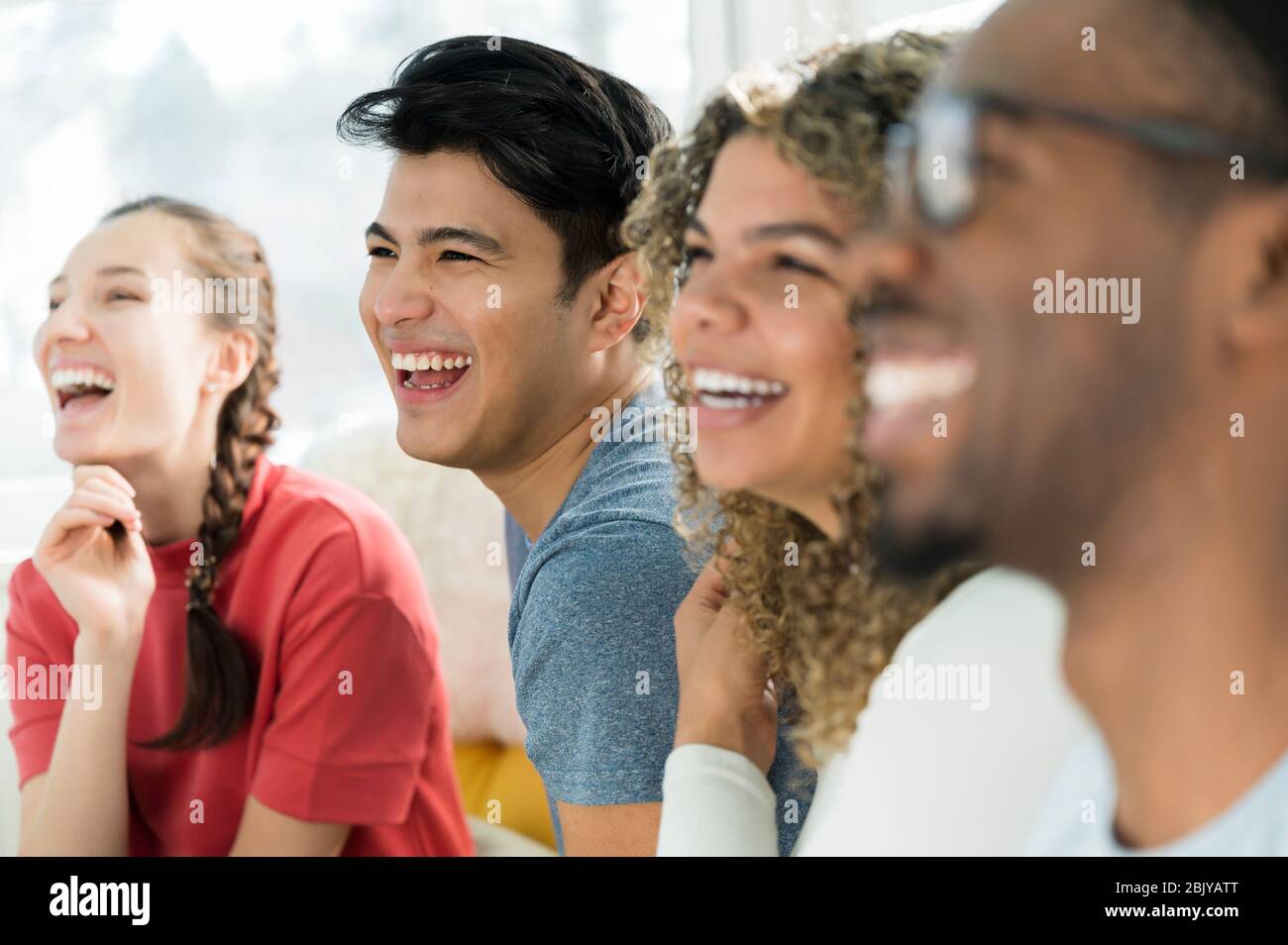 Group of friends laughing togetherÂ Stock Photo - Alamy
