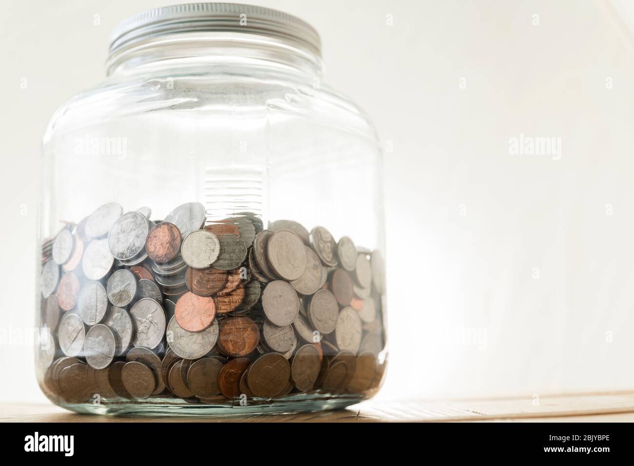 Big jar full of coinsÂ Stock Photo - Alamy