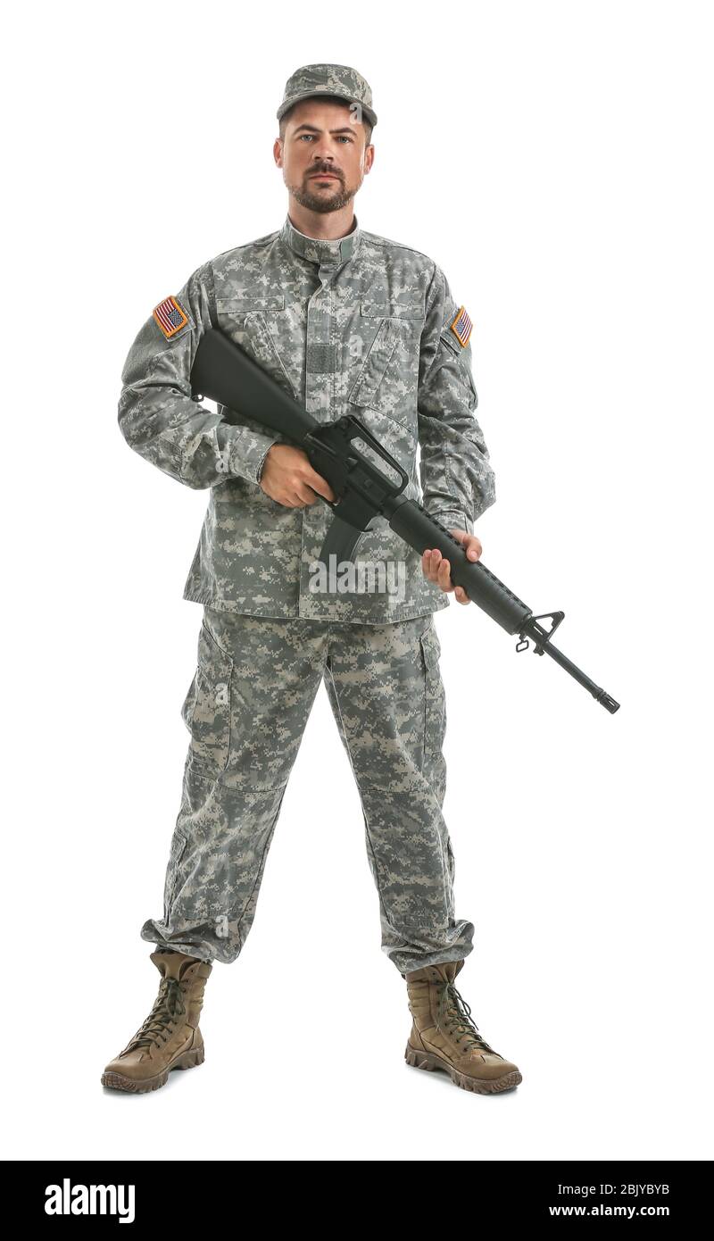 Soldier with assault rifle on white background Stock Photo - Alamy