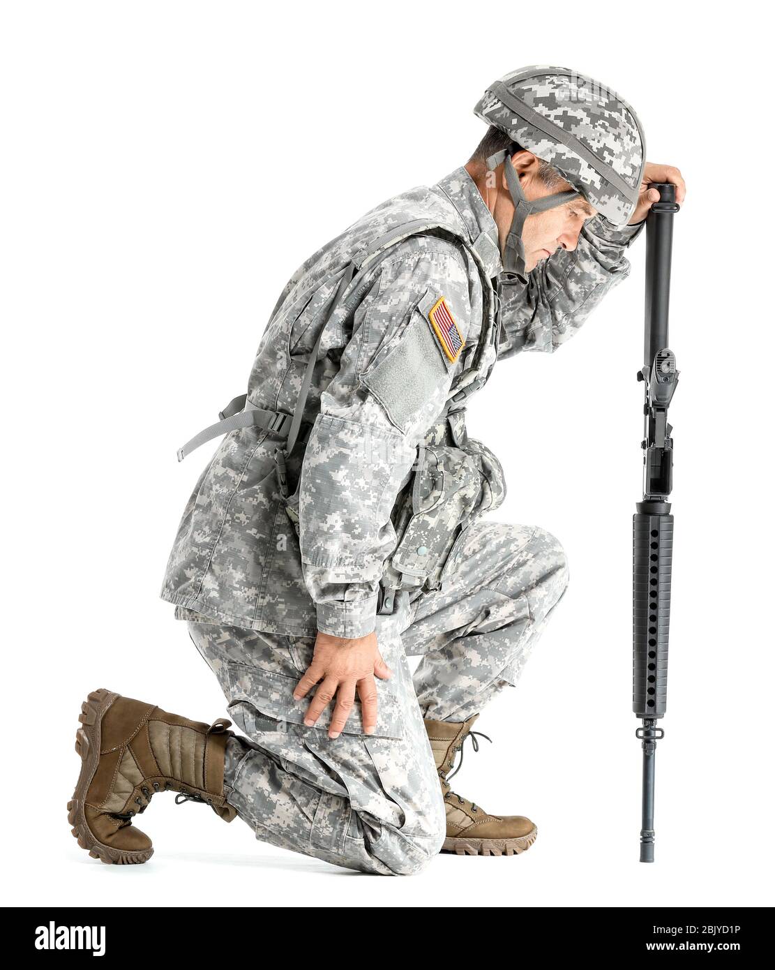 Mature male soldier mourning for his dead comrade on white background ...