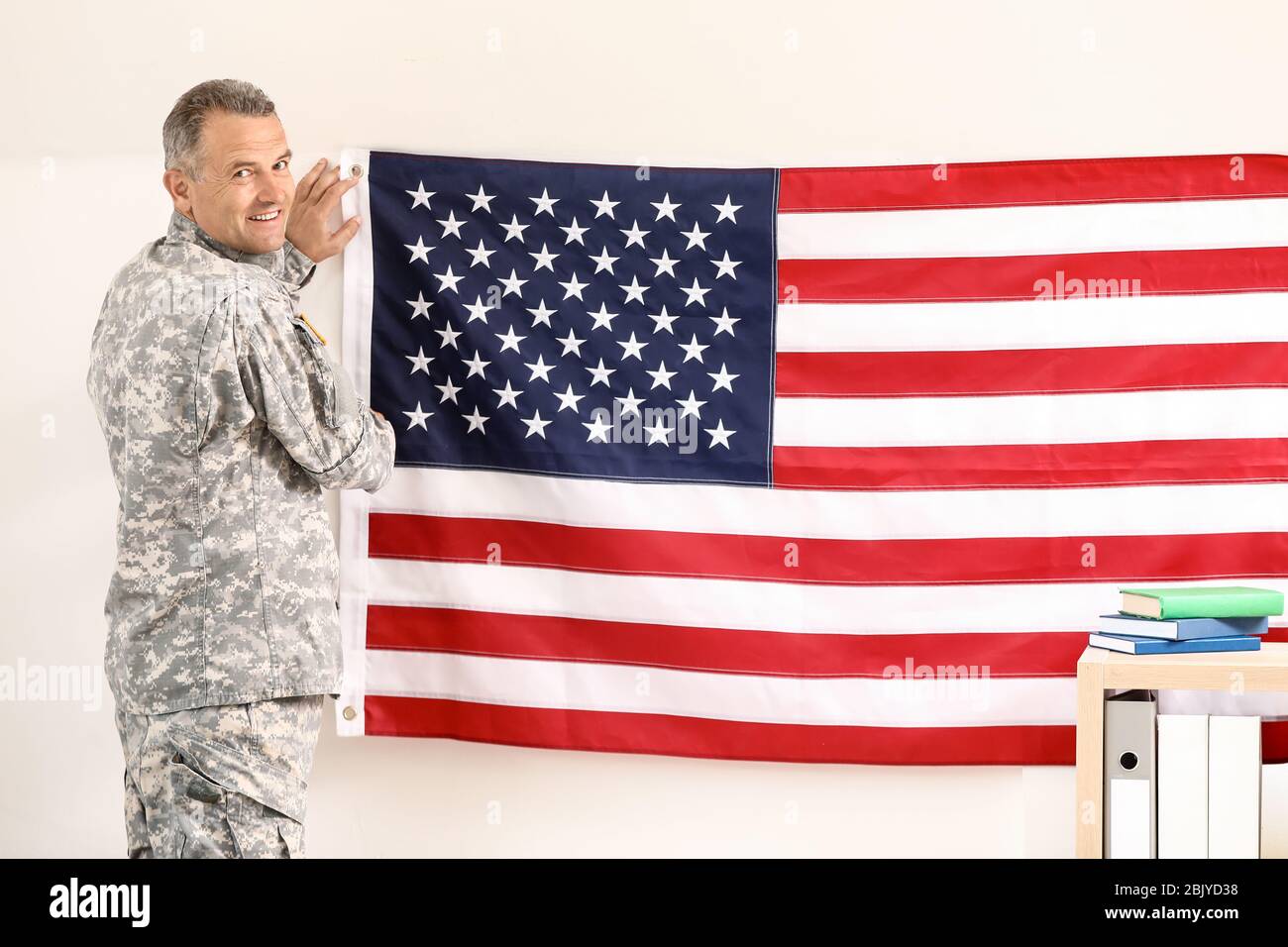 American flag hanging on building hi-res stock photography and images ...
