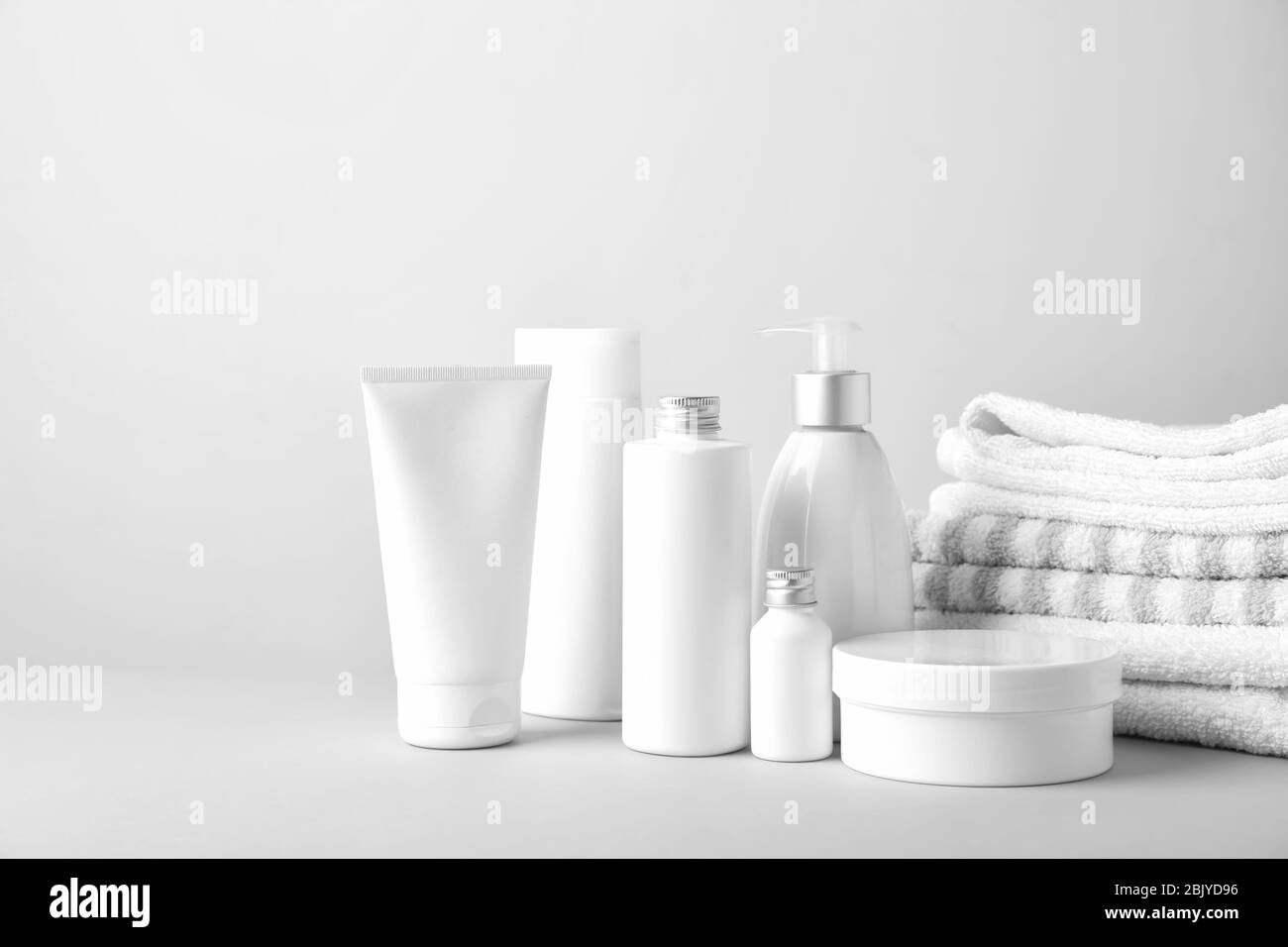 Set of cosmetic products on light background Stock Photo - Alamy