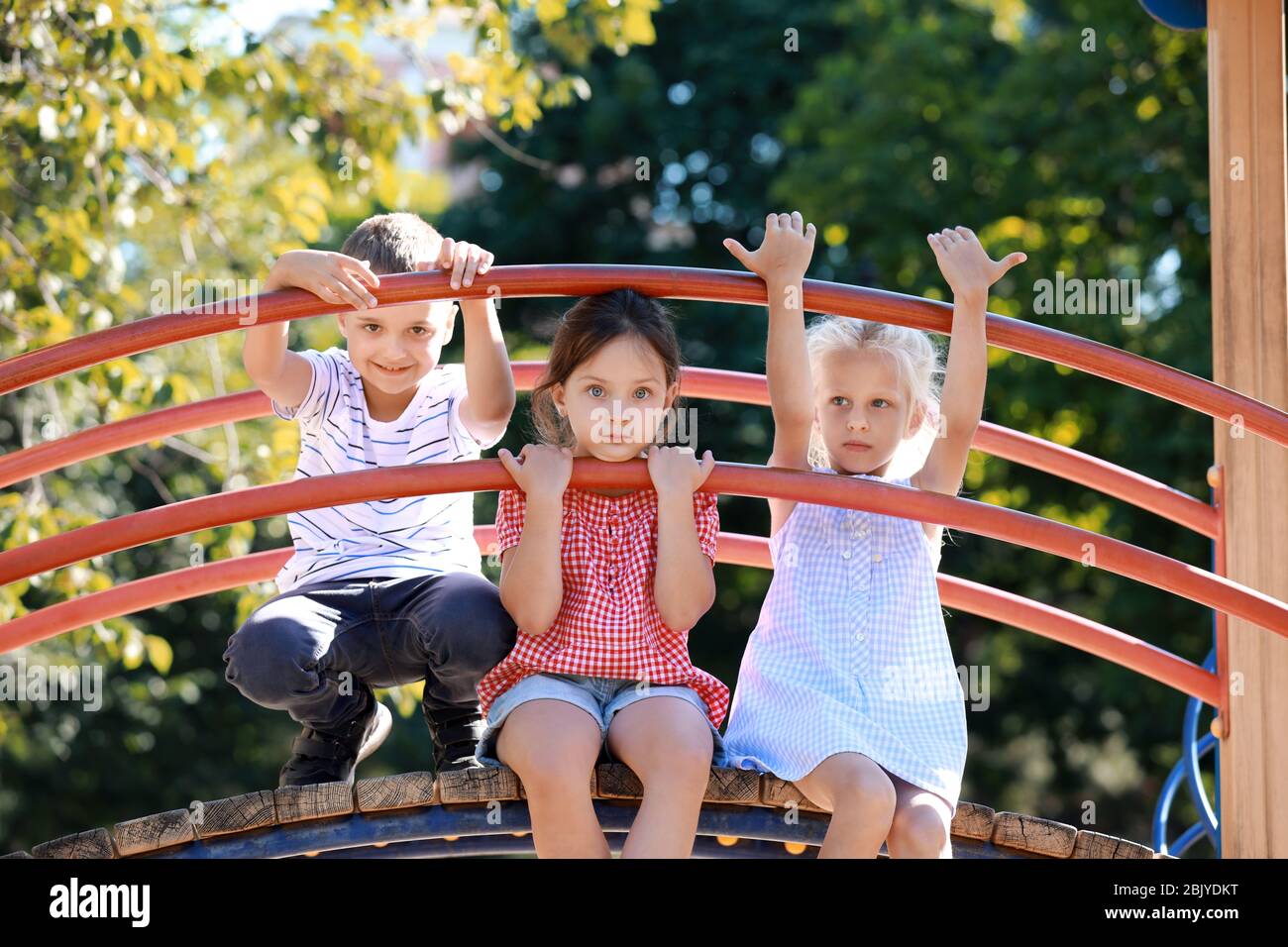 Cute little children on playground outdoors Stock Photo - Alamy