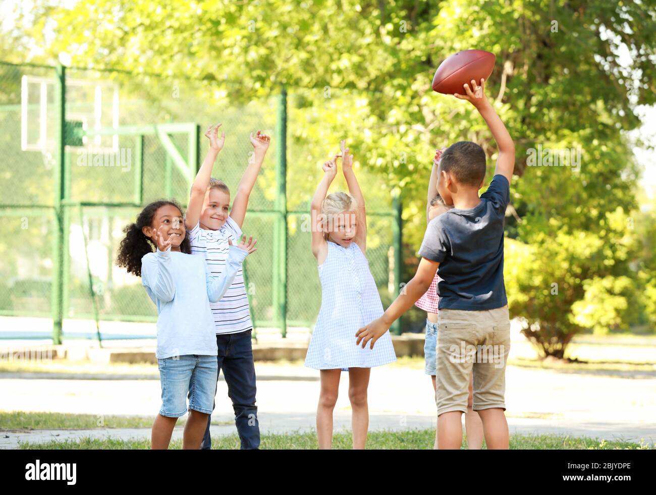 Rugby playing children hi-res stock photography and images - Alamy