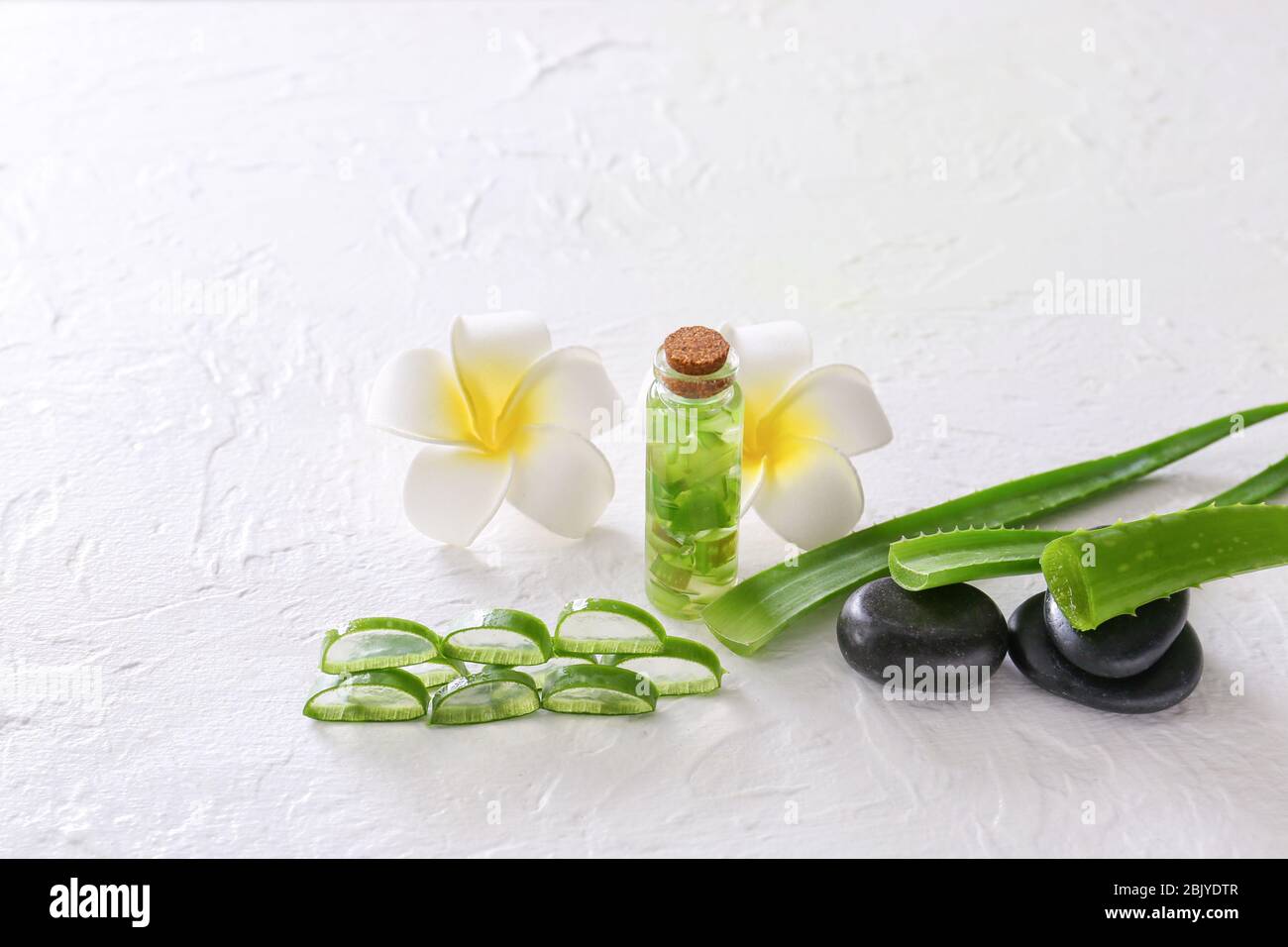 Spa composition with aloe vera on light background Stock Photo - Alamy
