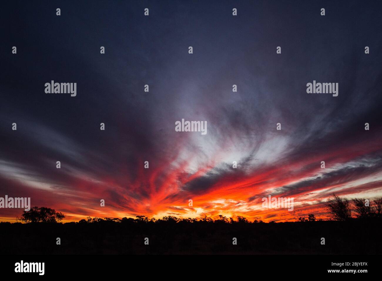 Sunset in the Australian outback Stock Photo - Alamy