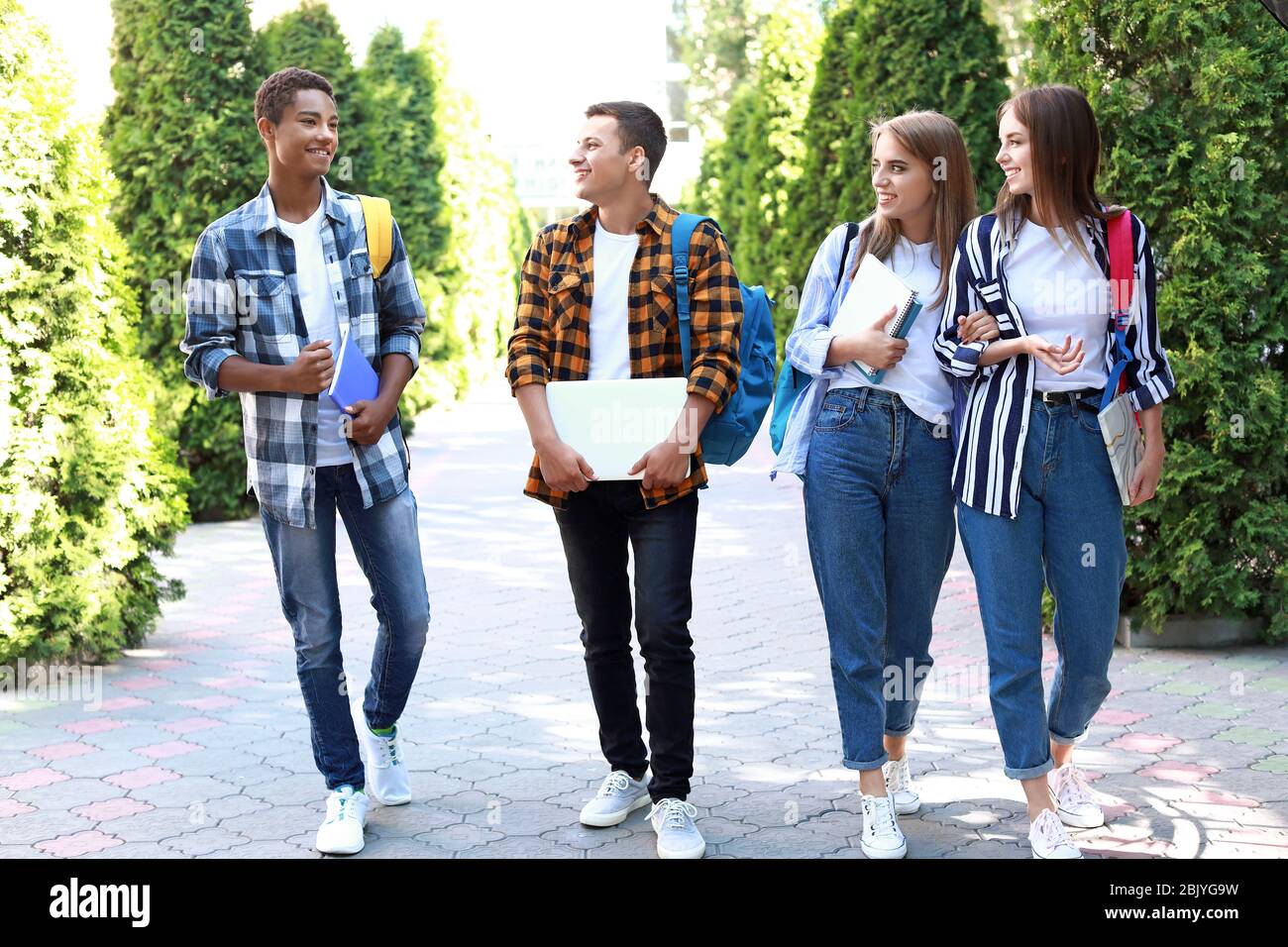 Portrait of young students outdoors Stock Photo - Alamy