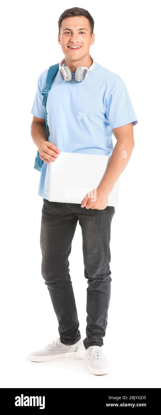 Portrait of young student with laptop on white background Stock Photo ...